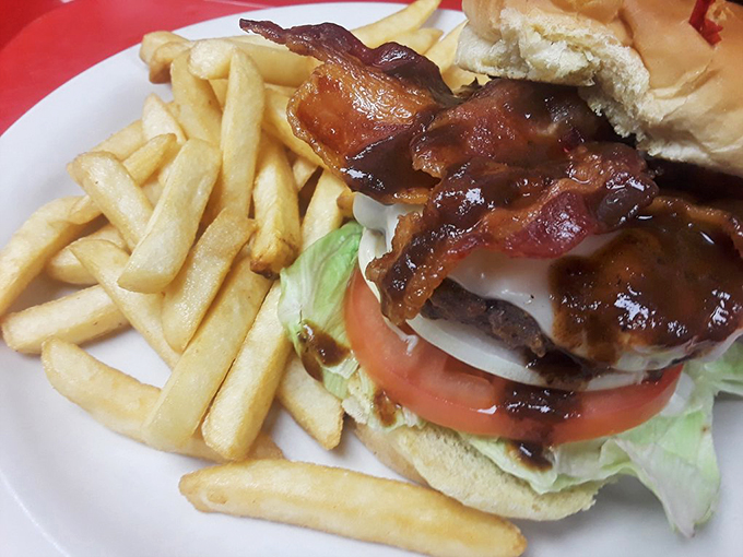 Burger nirvana achieved! This smoky masterpiece stacks up flavor faster than you can say "extra napkins, please!"