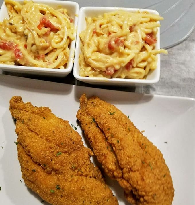 Golden fried catfish meets creamy chicken spaghetti in a combination that makes choosing just one dish nearly impossible.