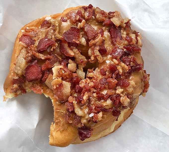 That first bite reveals layers of flavor and texture that'll make you question every donut decision you've made before.