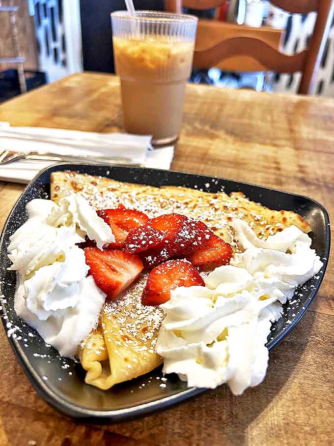 Fresh strawberries and whipped cream transform a simple crepe into a masterpiece that's almost too beautiful to eat. Almost.