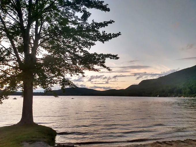 Sunset at Branbury transforms the lake into liquid gold, a daily show that outperforms any Netflix special.