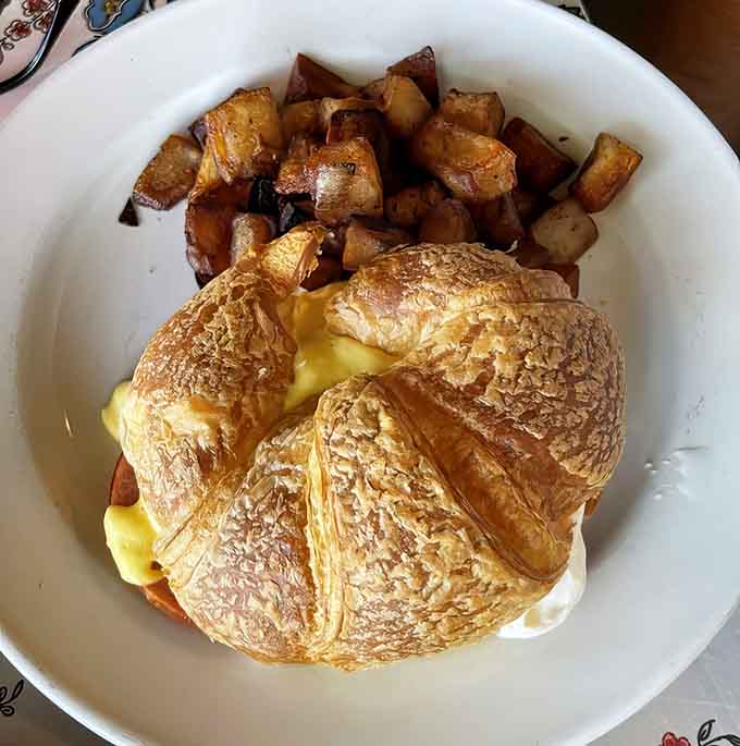 Eggs Benedict gets the French treatment on a croissant, because sometimes traditional English muffins just don't cut it anymore.