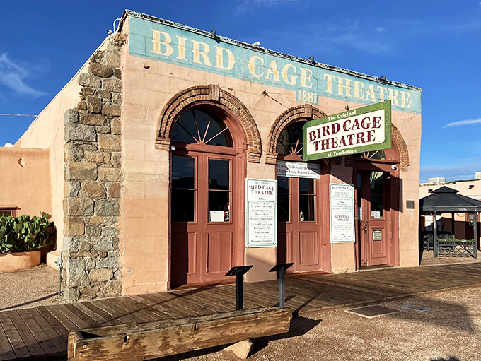The Bird Cage Theatre stands as Tombstone's most notorious establishment, its walls still bearing 140 bullet holes from rowdier nights.