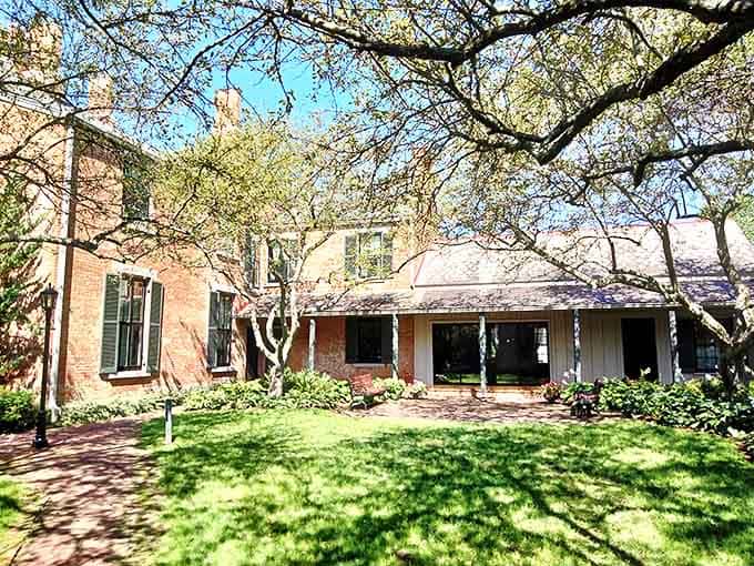 A tranquil courtyard where Victorian ladies might have taken afternoon tea, sheltered by trees that have witnessed generations come and go.
