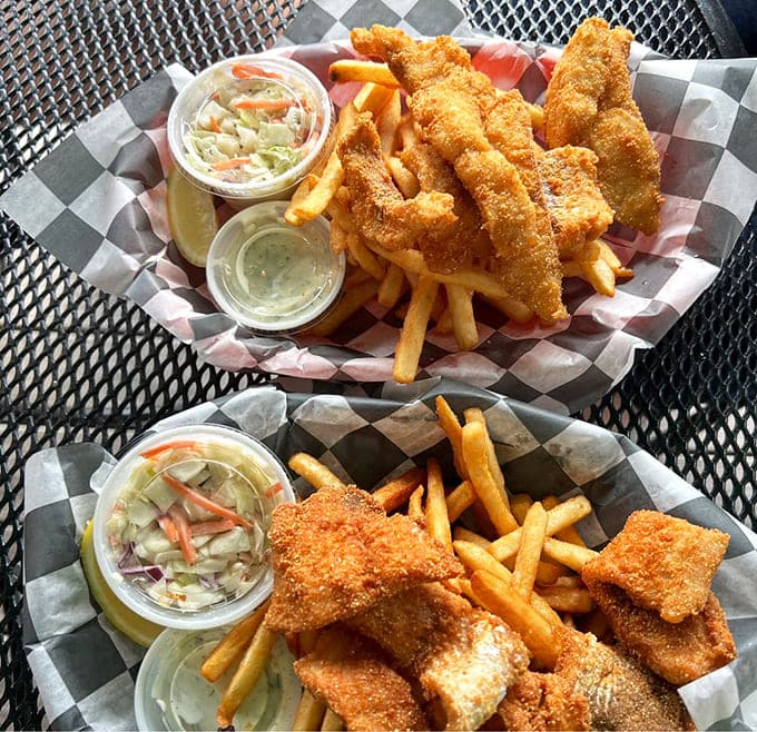 This fish and chips combo with coleslaw is basically a masterclass in how to treat seafood right, no culinary degree required.
