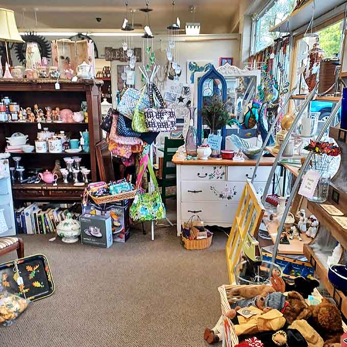 Every nook and cranny holds potential discoveries – vintage toys nestle against handcrafted textiles in this delightful corner of organized chaos.