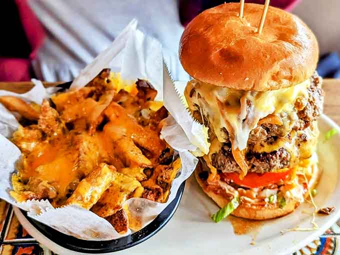 A mountain of beef and cheese flanked by golden cheese fries&mdash;because when you're already committing to excess, why stop at just the burger?