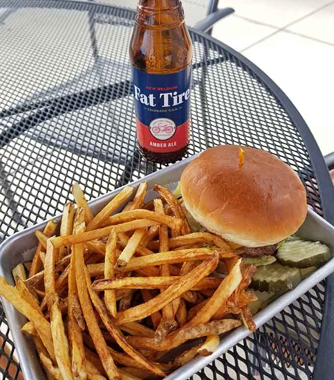 A perfectly constructed burger paired with crispy fries proves that sometimes the classics are classic for excellent reasons.