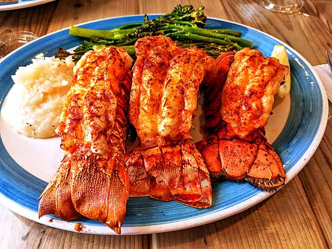 Triple the tails, triple the joy! These perfectly grilled lobster tails are sweet, succulent, and served with drawn butter and fresh asparagus for a seafood feast fit for royalty.