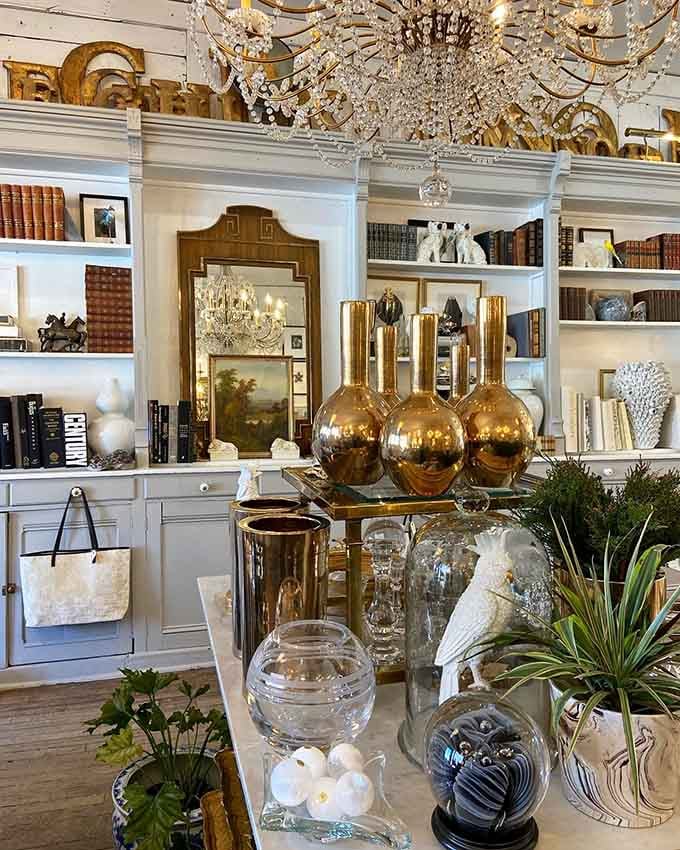 Floor-to-ceiling shelving packed with vintage treasures demonstrates that more really can be more when everything's chosen with an expert eye and arranged with care.