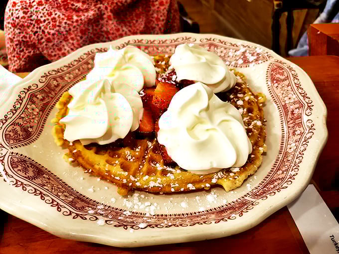 This isn't just any waffle &ndash; it's a golden throne for mountains of whipped cream and fresh berries, waiting to make your breakfast dreams come true.