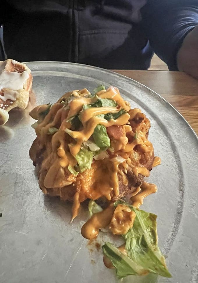 The chicken taco pizza waffle brings Tex-Mex flair to breakfast innovation, because why choose between cuisines when you can have both?