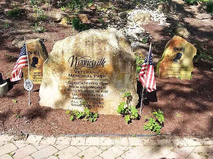 Waynesville's Veterans Memorial Park offers a poignant reminder of sacrifice, where American flags stand sentinel beside weathered stone tributes.