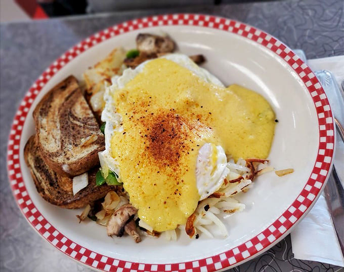 When your Cajun breakfast arrives looking this good, you know you're in for a flavor journey that'll wake up taste buds you forgot you had.