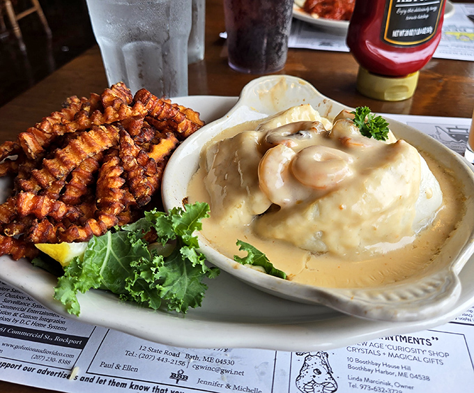 Simple perfection: flaky white fish, golden cracker crumbs, and a baked potato &ndash; comfort food that makes you want to hug the chef.