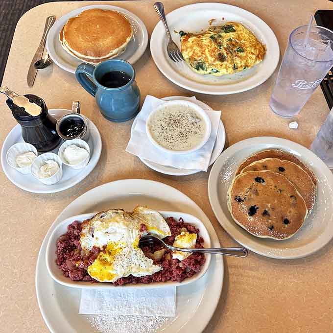 A breakfast spread that would make even Ron Swanson nod in solemn approval &ndash; pancakes, eggs, and all the morning essentials.
