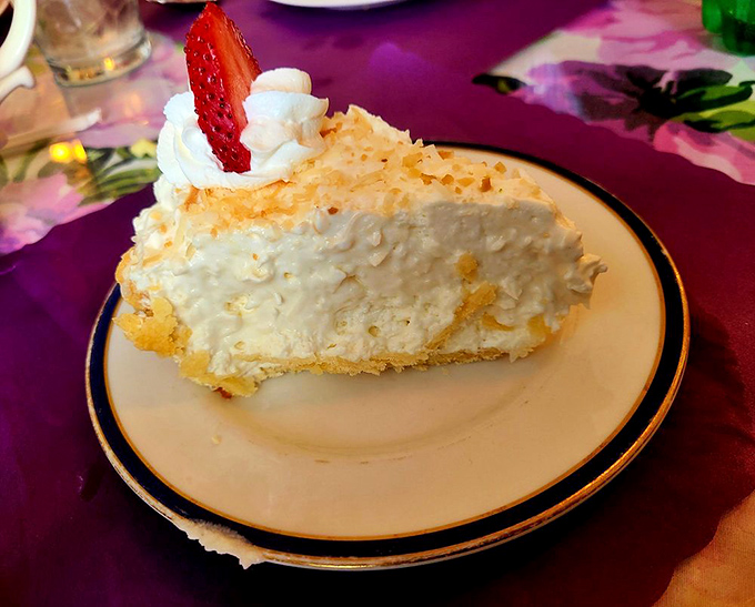 Cloud-like coconut cream pie topped with a perfect strawberry &ndash; the kind of dessert that makes conversation stop and eyes close in bliss.