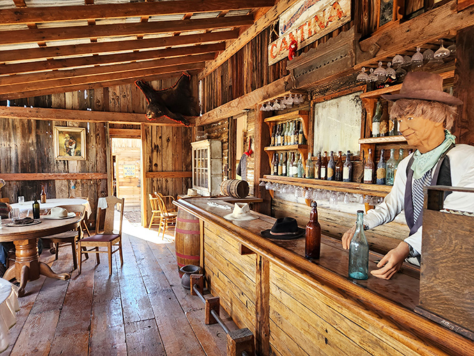 The saloon interior whispers of whiskey deals and poker fortunes won and lost. Those cowboy hats might still be waiting for their owners.