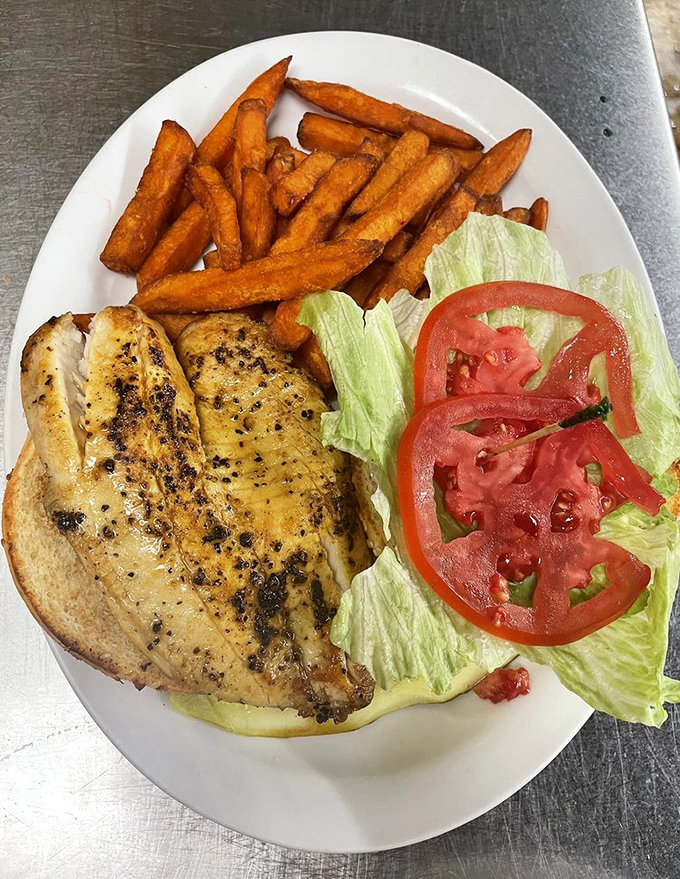 Simple perfection: a perfectly seasoned chicken breast with sweet potato fries proves Alice's knows lunch as well as breakfast.