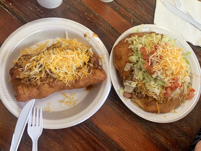 Talk about dynamic duos! A chili cheese dog wrapped in fry bread sits alongside a classic Navajo taco, proving two culinary traditions are better than one.