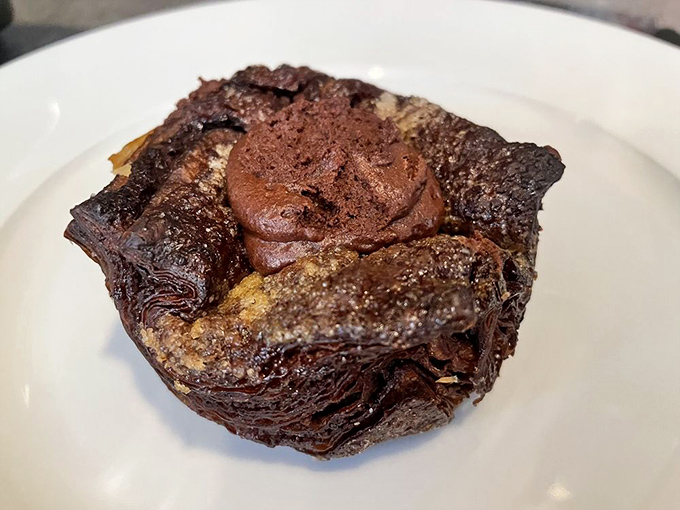 The chocolate kouign amann &ndash; where buttery layers meet molten chocolate in a union that should probably be illegal.