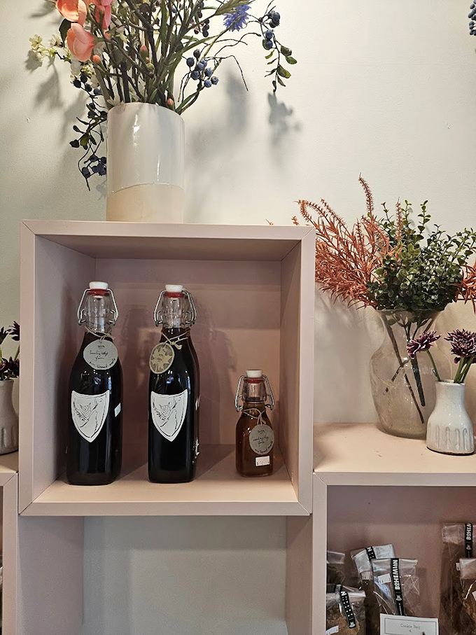 Flower power meets flavor central. These shelves are like a still life painting come to life, with bottles promising liquid happiness.