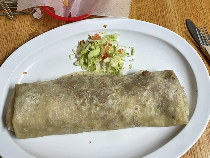 The fried carne asada burrito offers a crispy exterior that gives way to tender, flavorful meat &ndash; texture and taste in perfect harmony.