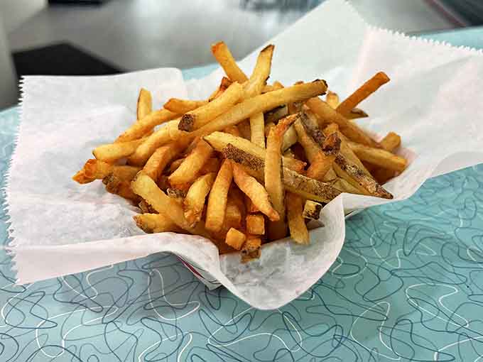 Golden, hand-cut potato perfection that arrives hot, crispy, and in a portion size that says, "We understand you, and we support your decisions."