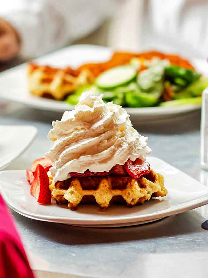 This isn't your average funnel cake &ndash; it's a strawberry-topped Li&egrave;ge waffle that makes carnival food look like amateur hour.