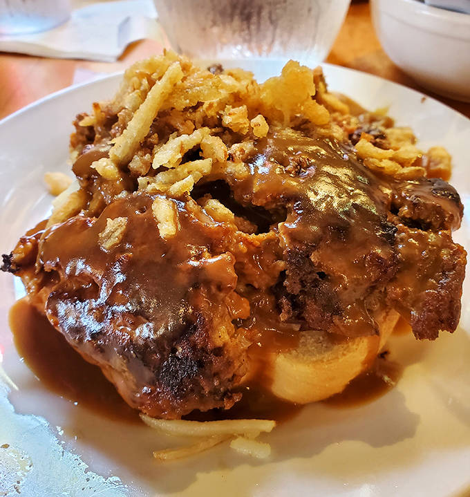 The legendary meatloaf in all its glory &ndash; tender, perfectly seasoned, and swimming in gravy that you'll want to bottle and take home.