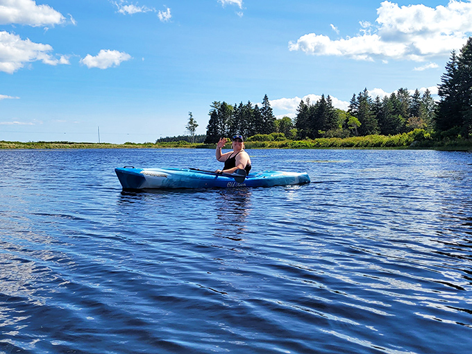 Paddling through pristine waters, where each stroke takes you further from everyday worries and closer to nature's rhythm.