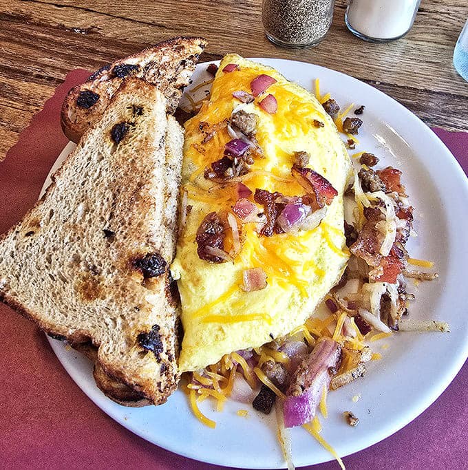 This isn't just an omelet &ndash; it's a treasure chest of flavors where cheese pulls for miles and every bite delivers a perfect balance.