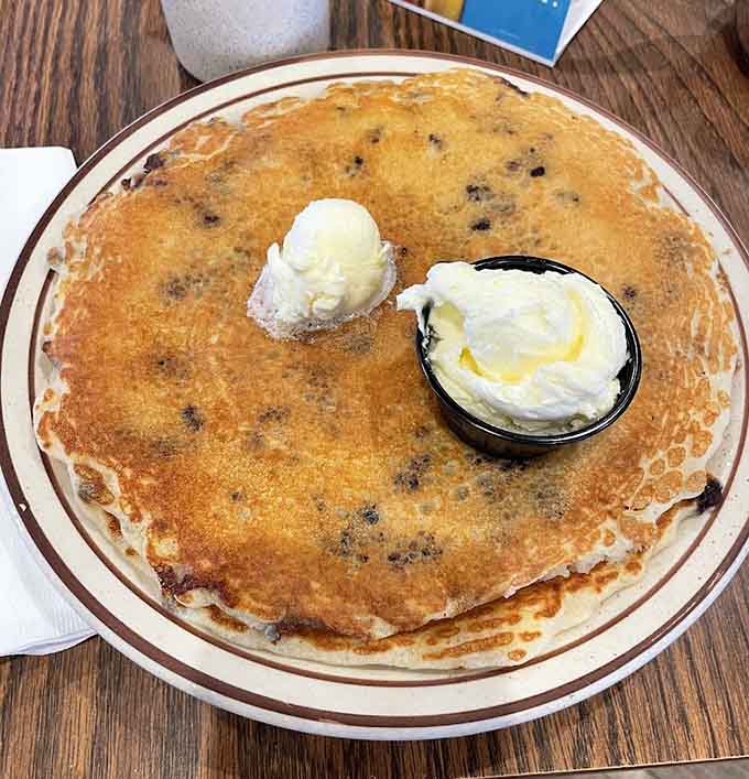 These massive pancakes could double as landing pads, golden and fluffy with just the right amount of butter and syrup on top.