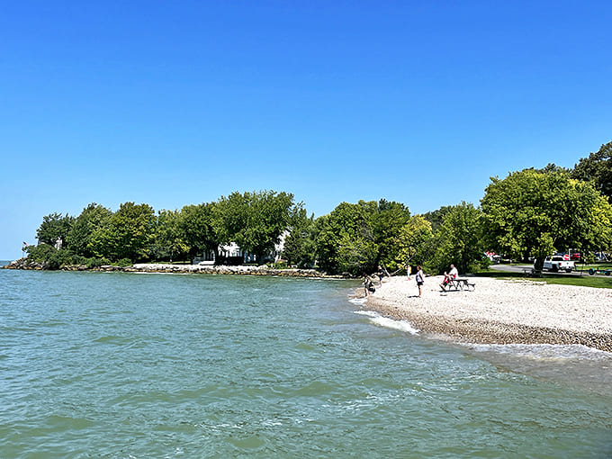 Summer brings beachcombers to Catawba's shores, where every smooth stone holds potential as a treasure or the perfect skipping candidate.