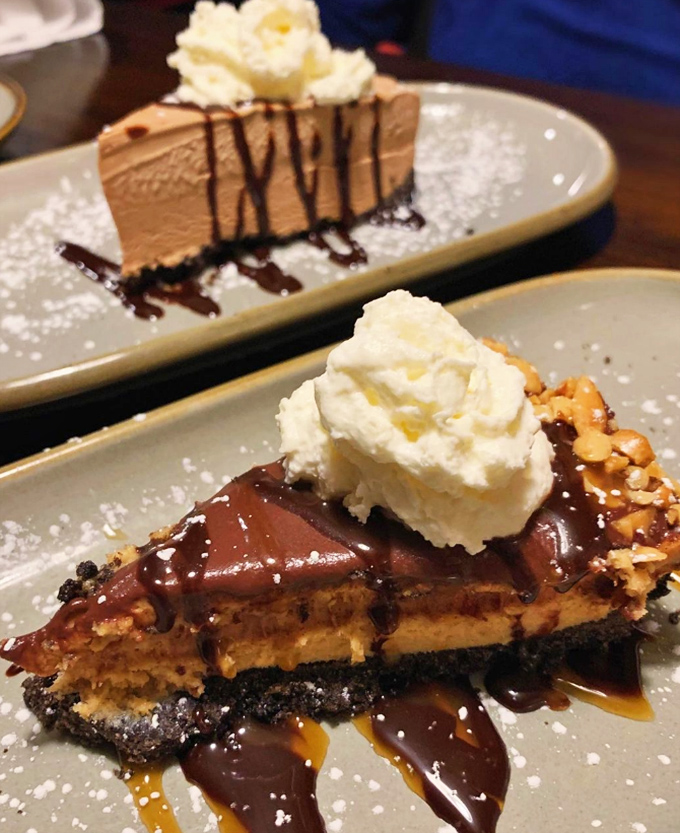 Dessert heaven on a plate – layers of decadence topped with whipped cream that melts into pools of chocolate bliss.