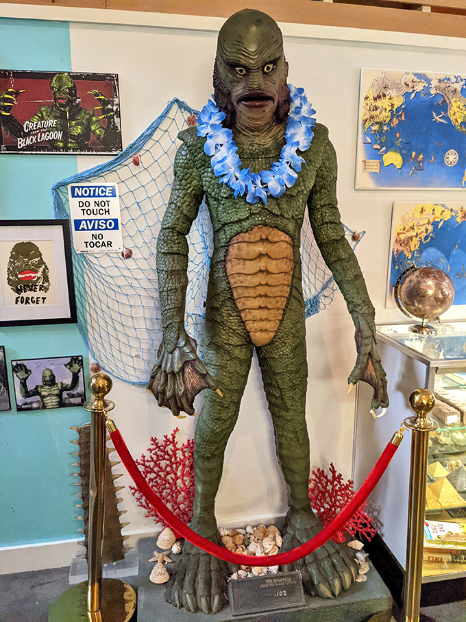 The Creature from the Black Lagoon enjoys retirement in Maine, sporting a festive lei that really brings out the green in his scales.