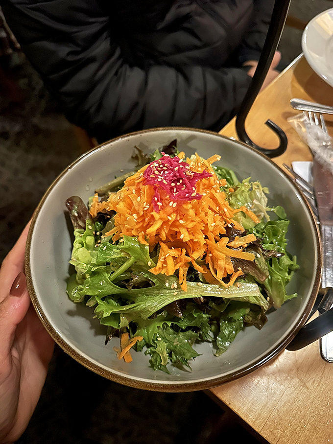 Not just any salad &ndash; this vibrant bowl proves green can be exciting with crisp greens, colorful toppings, and thoughtful presentation.