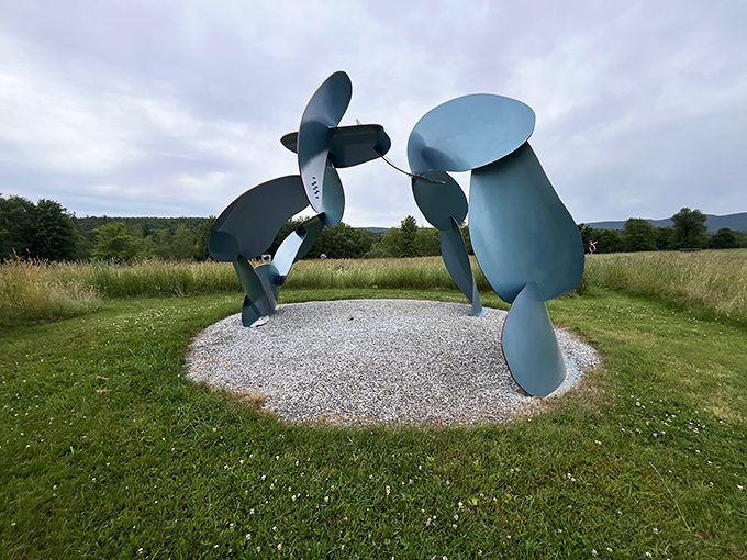 Industrial materials transformed into graceful curves &ndash; this blue metal piece seems to defy both gravity and expectations.