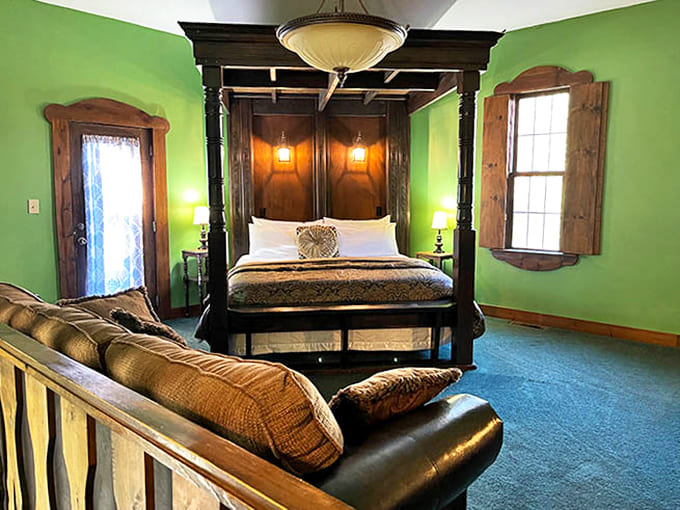 Emerald walls embrace a four-poster bed fit for royalty &ndash; sleep like a king without the worry of peasant uprisings.
