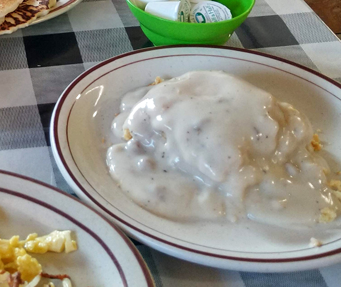 Another angle of breakfast perfection &ndash; this plate of biscuits and gravy has caused more road trip detours than any GPS recalculation.