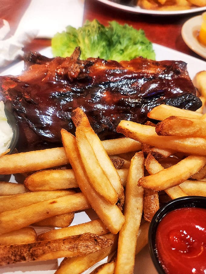 Rib revelation! Fall-off-the-bone perfection that makes you forget table manners exist. Napkins required, dignity optional.