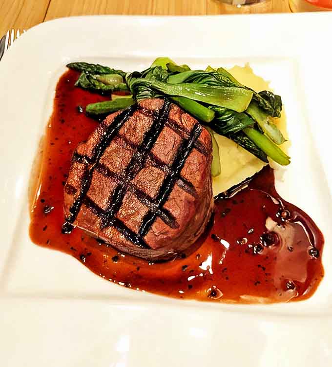 Grill marks tell no lies &ndash; this perfectly seared steak with its glistening reduction sauce proves that simple can be spectacular.