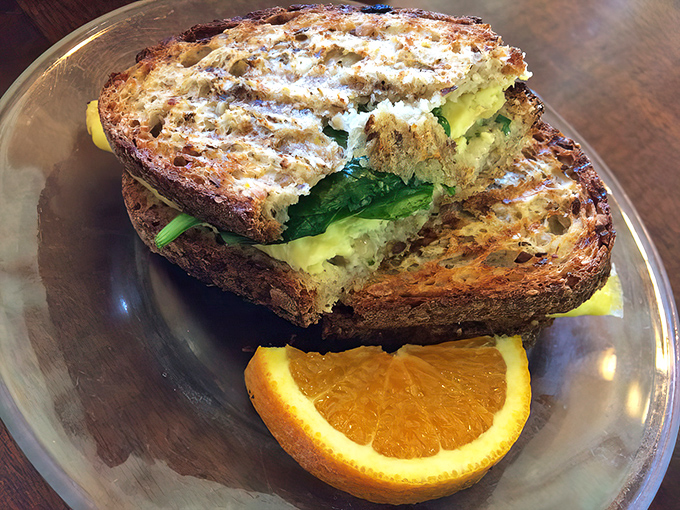 A sandwich that could convert carnivores&mdash;fresh greens and creamy avocado nestled between perfectly toasted slices.