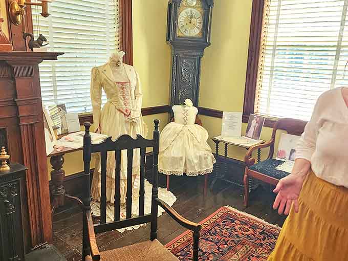 These delicate white dresses tell silent stories of special occasions, impossible waistlines, and the hands that stitched every careful pleat.