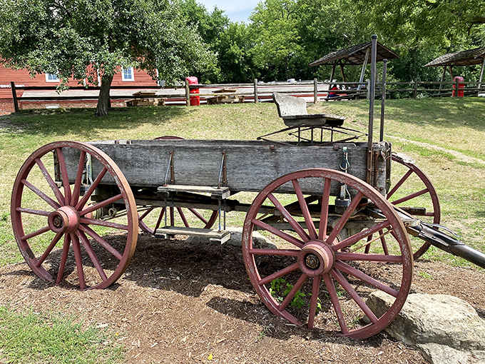 This vintage wagon speaks to Yates' deep agricultural roots, a reminder of how Michigan's apple harvests have traveled through generations.