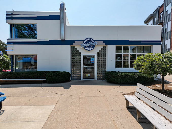 Retro cool incarnate! The exterior screams "1950s chic" with its sleek lines and cheery blue awnings, making you want to break out in the hand jive.