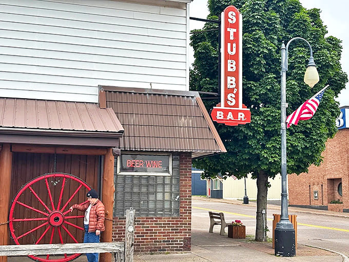 The iconic red neon "STUBBS BAR" sign beckons visitors to this Ontonagon establishment where local history flows as freely as conversation.