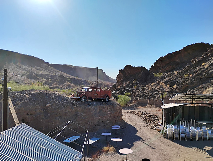 Who parked the time machine? This vintage fire truck stands guard, ready to extinguish your thirst in style.