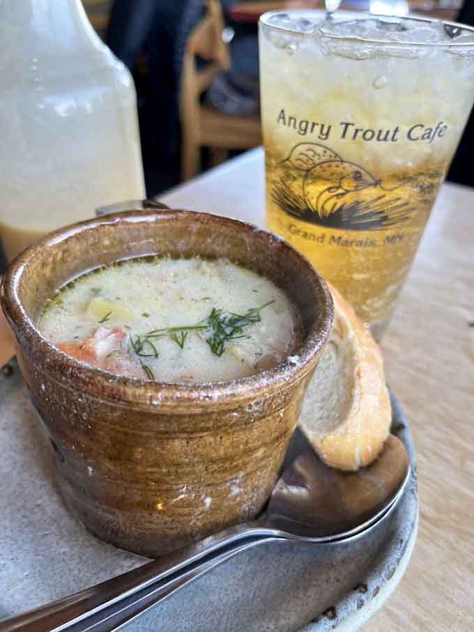 Fresh salmon swimming in creamy broth with vegetables and potatoes creates the kind of bowl that makes you slow down and savor every single bite.