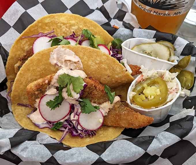 Golden-fried fish meets creamy chipotle sauce in tacos so good, ordering a second round isn't gluttony, it's just common sense and good judgment.